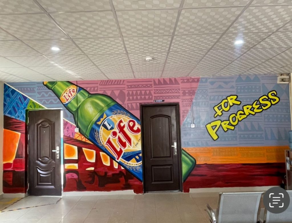 Colorful Mural of Life Beer Bottle and “For Progress” Slogan - Cedar ...